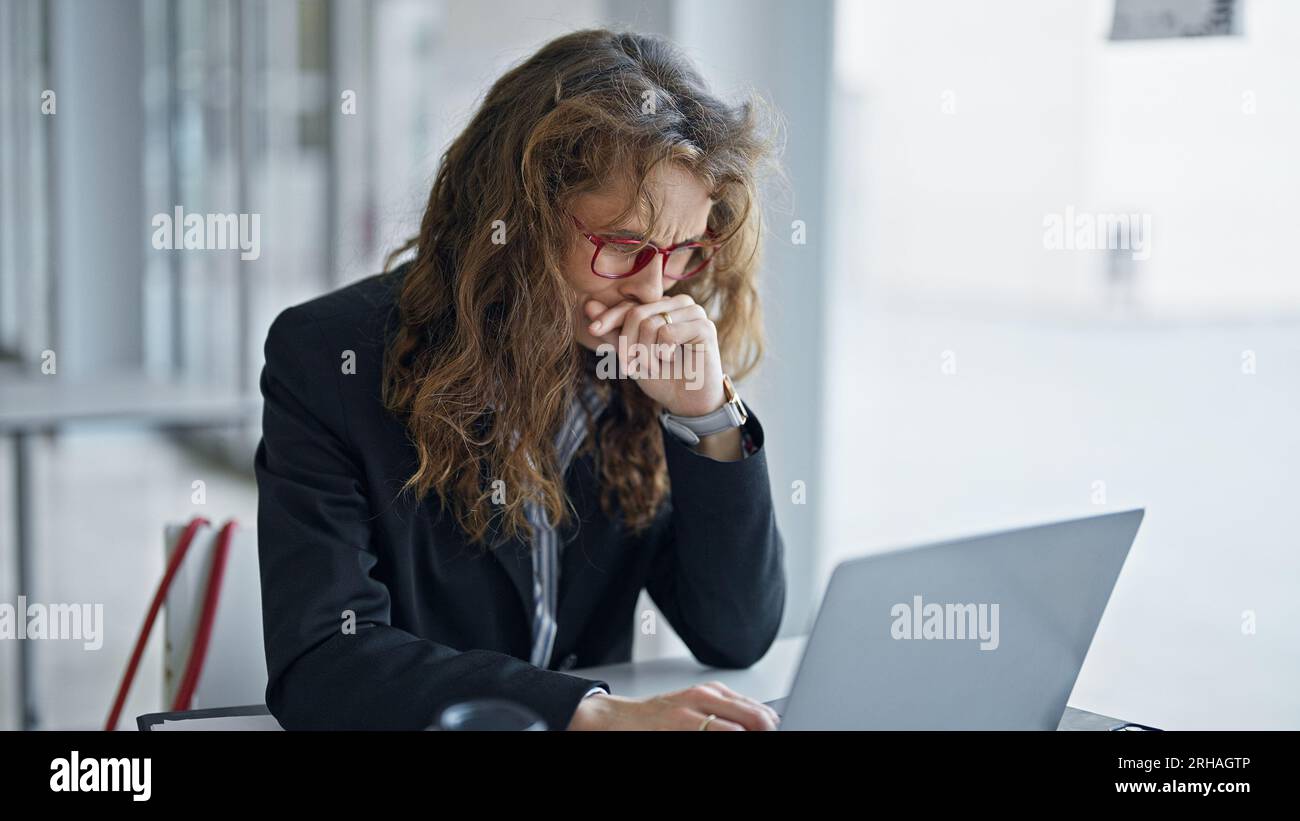 Sick woman coughing using laptop hi-res stock photography and images ...