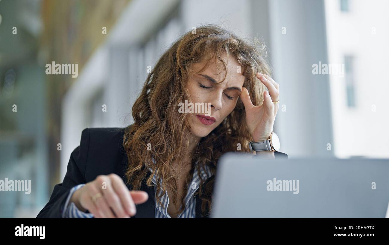 Young woman business worker working stressed at the office Stock Photo ...