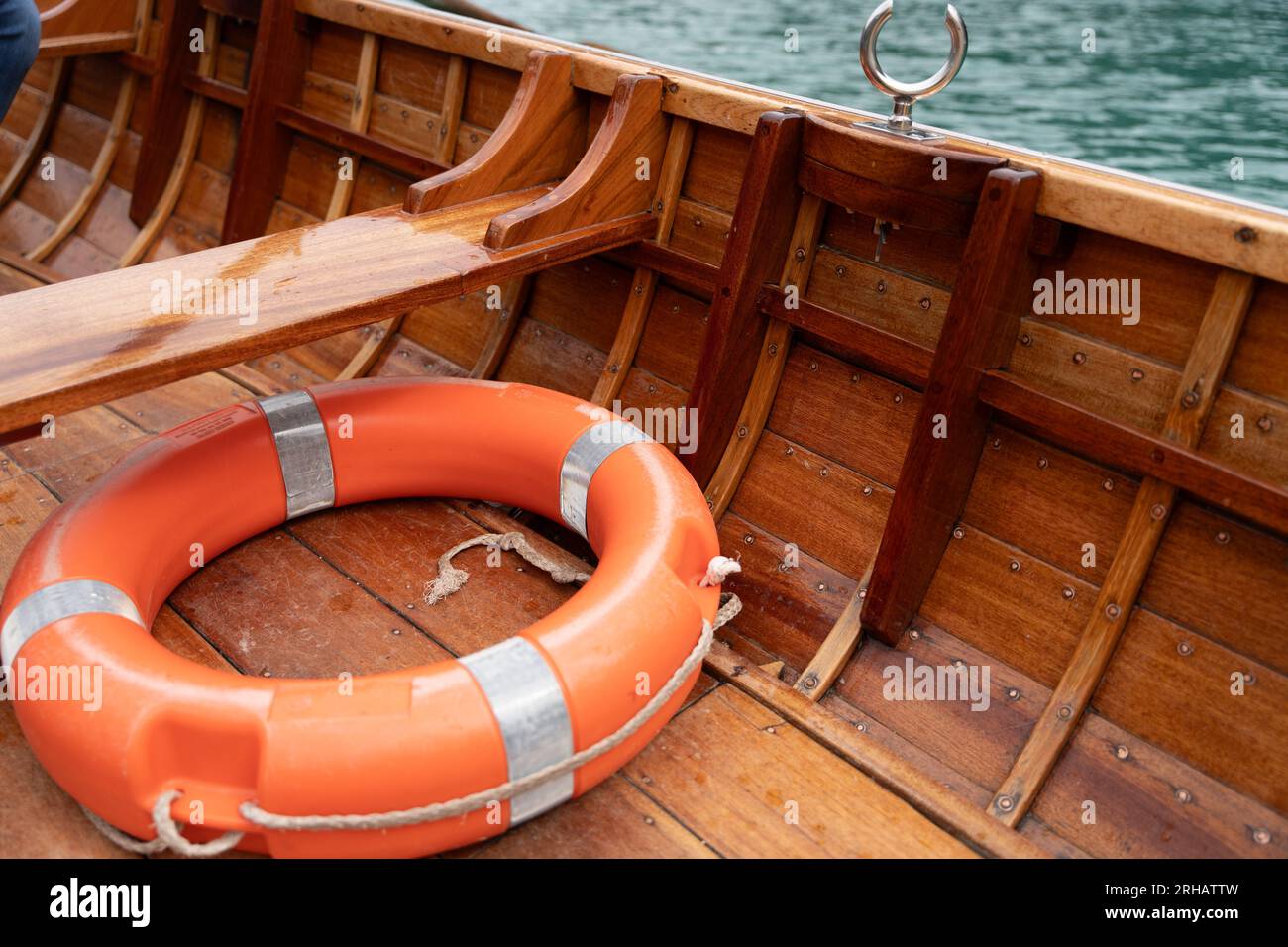 Traditional wooden rowing boat on scenic Lago di Braies in the ...
