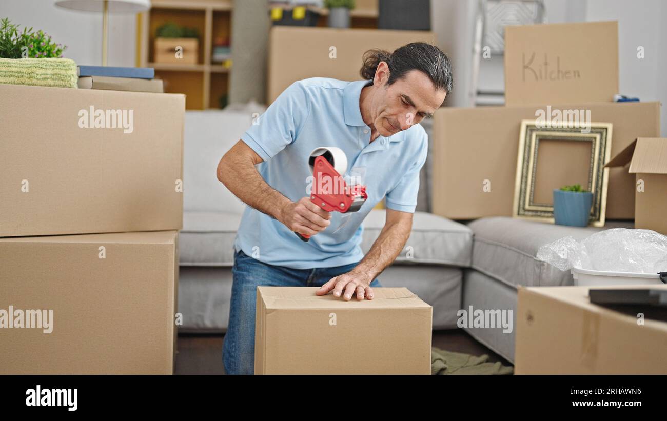 Cool person packing a box hi-res stock photography and images - Alamy