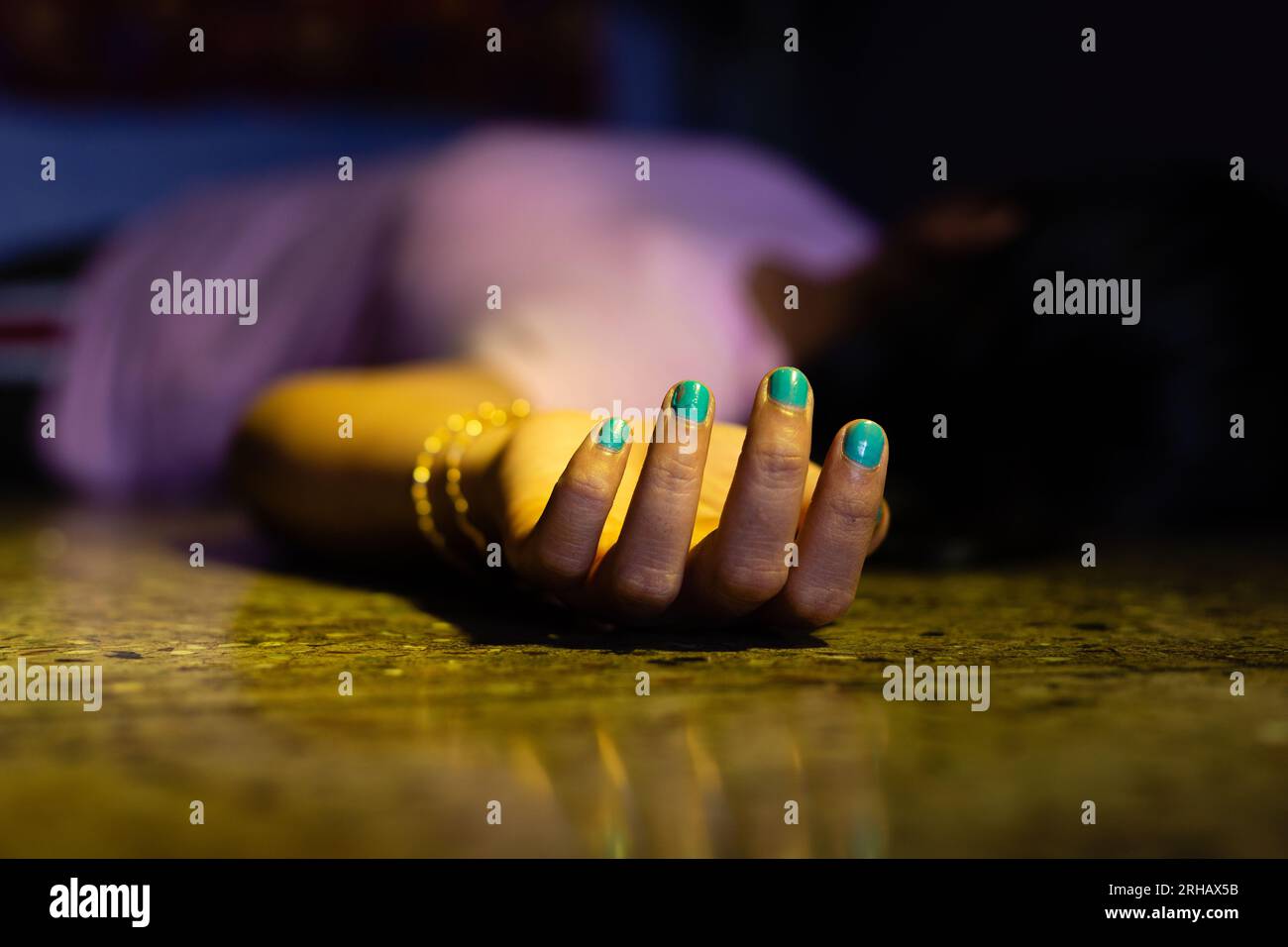 An Indian or Asian woman dead body with outstretched hand lying on ...