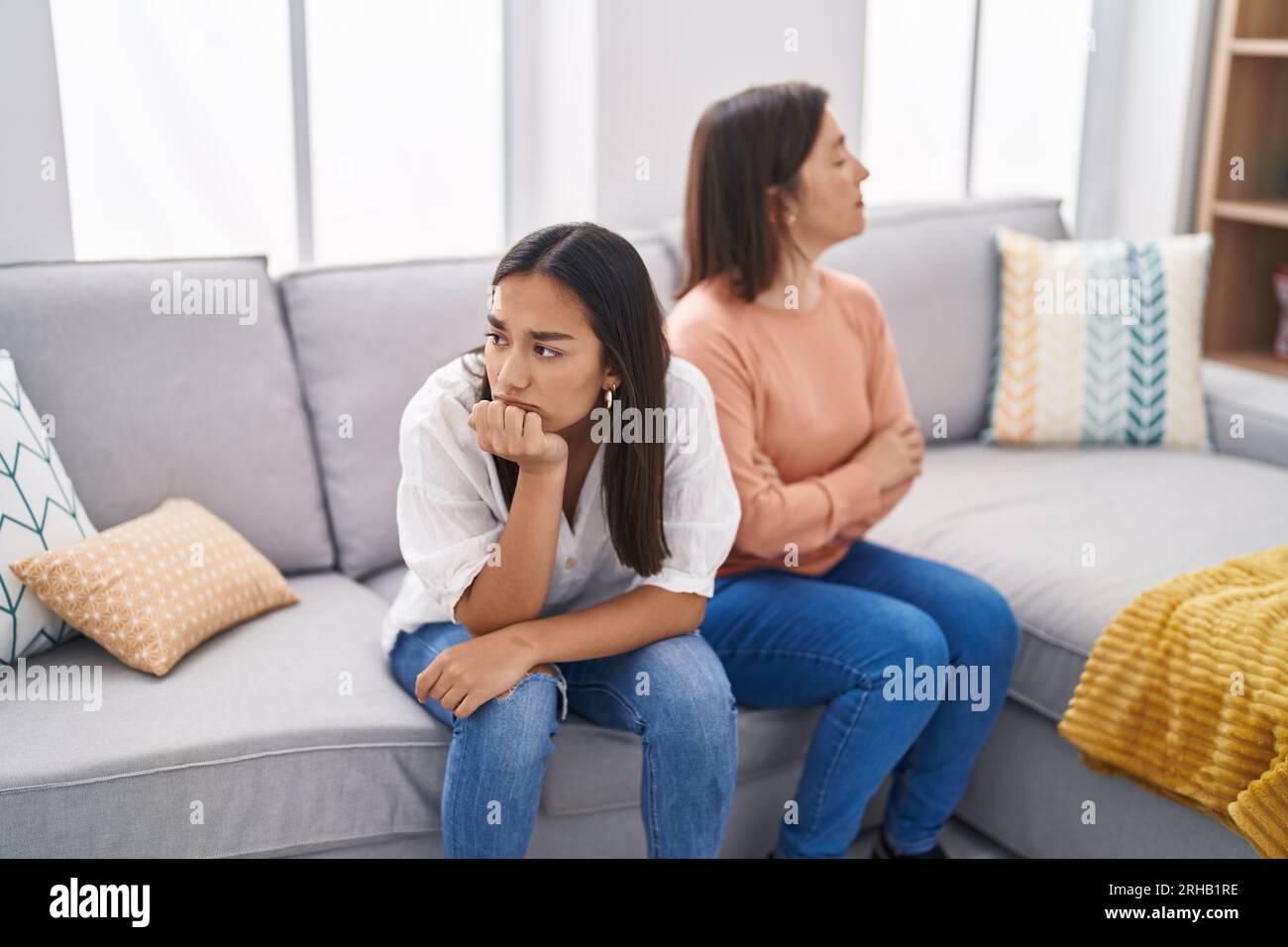 Two women mother and daughter arguing at home Stock Photo - Alamy