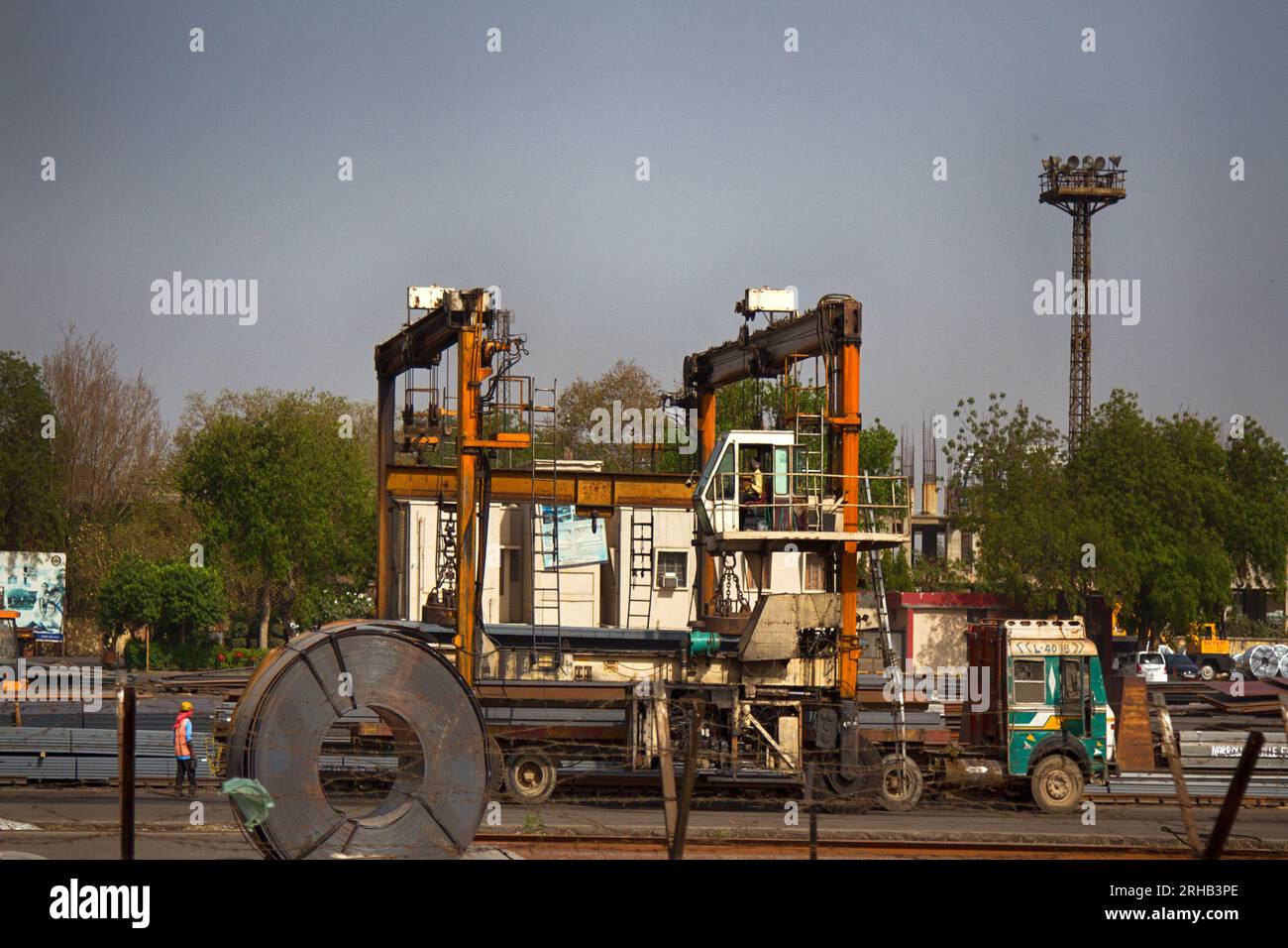 India, new Delhi - March 27, 2018: Indian Railways. Rail crane unloads ...