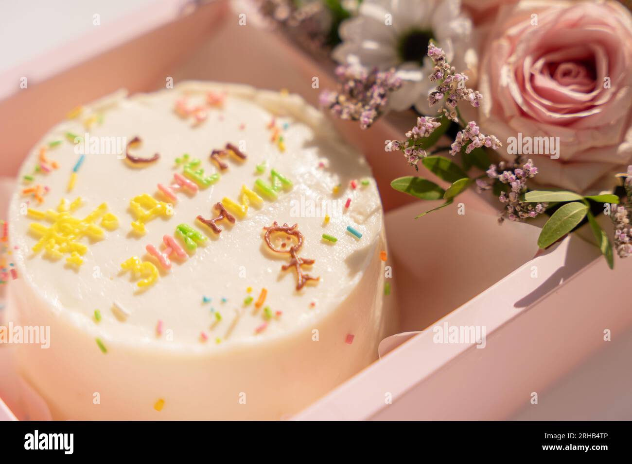 Cake with an inscription with blooming roses in pink gift box Stock ...