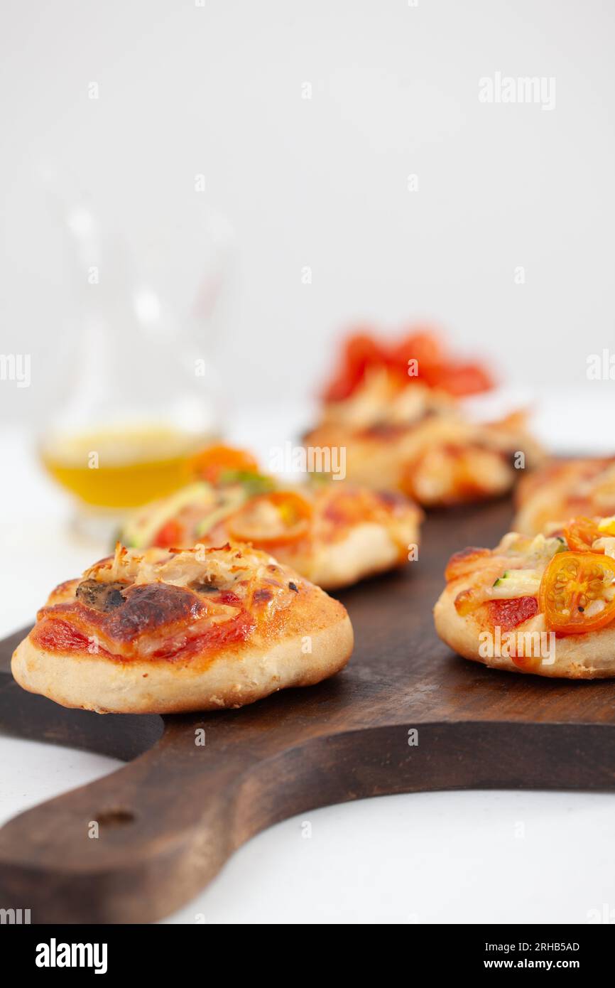 Delicious just baked homemade mini pizzas Stock Photo - Alamy