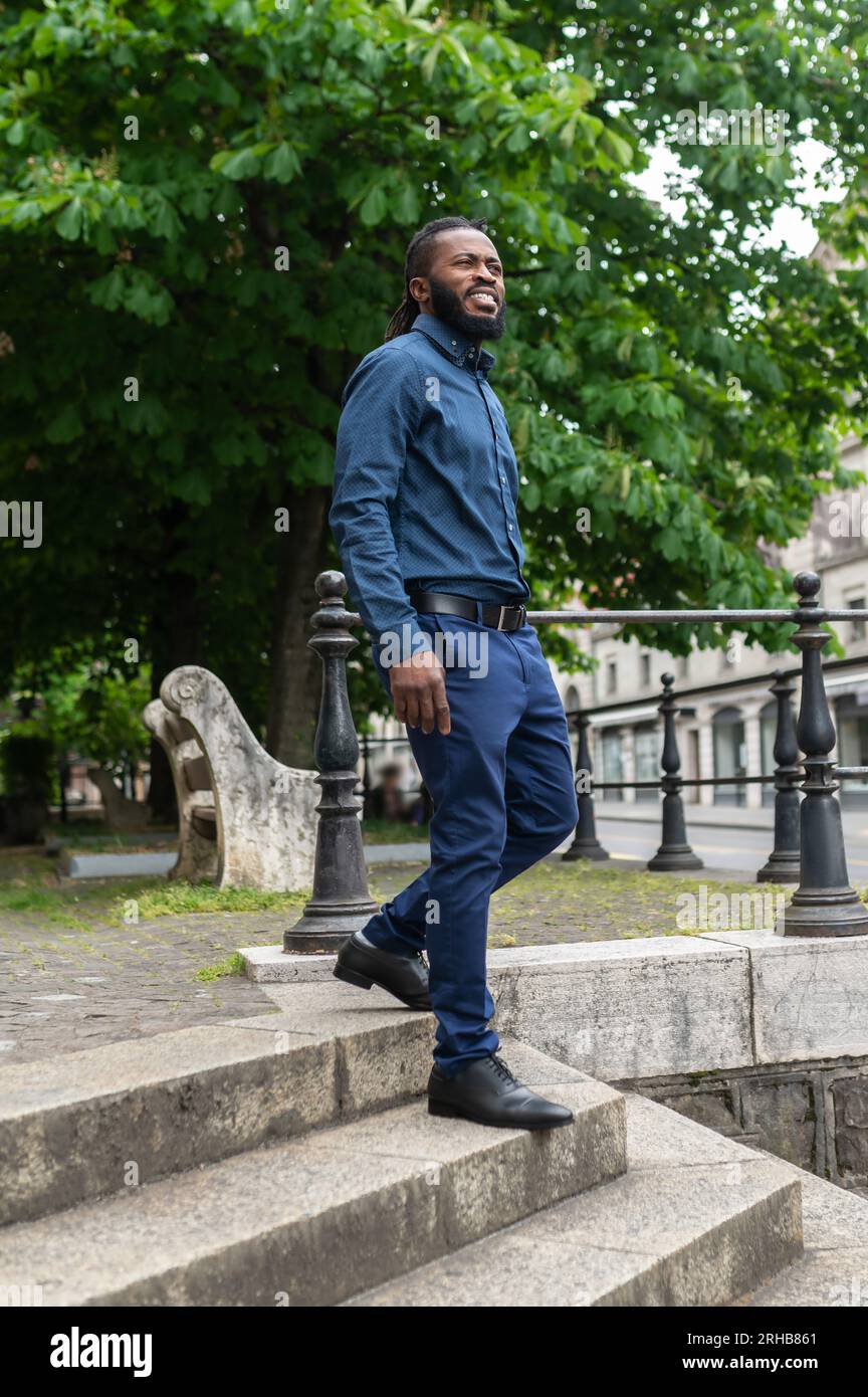 Tall handsome african american man in the street Stock Photo - Alamy