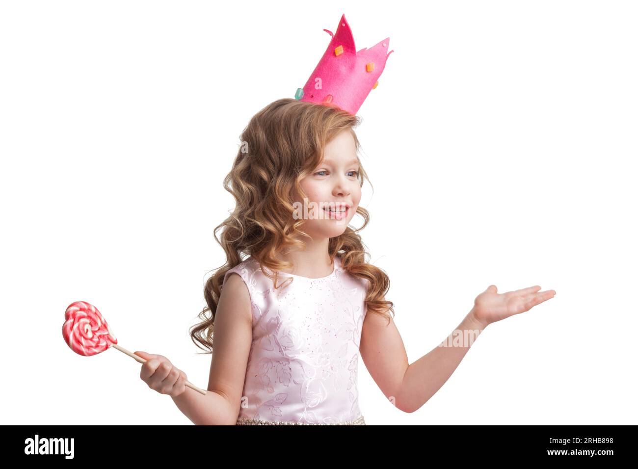 Happy laughing princess girl in crown and pink dress with lollipop on ...
