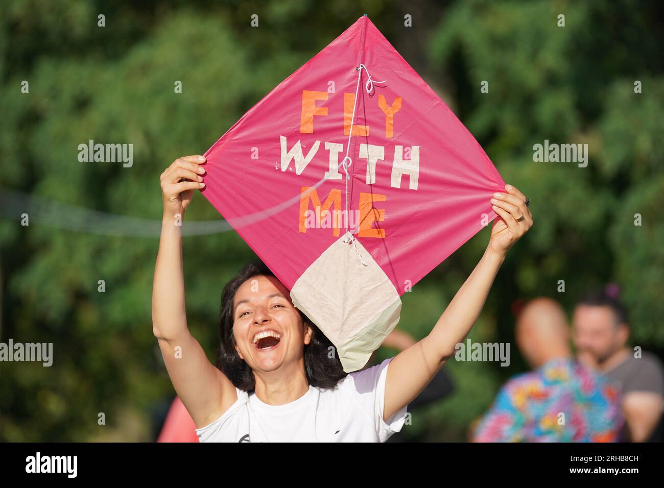People taking part in an Afghan kite-flying event at a park in London ...