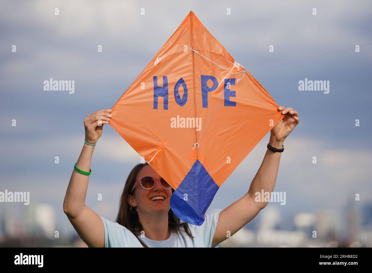 People taking part in an Afghan kite-flying event at a park in London ...