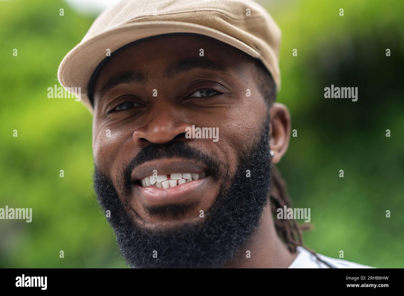 Portrait picture of a smiling dark-skinned handsome man Stock Photo - Alamy Portrait picture of a smiling dark-skinned handsome man Stock Photo - Alamy