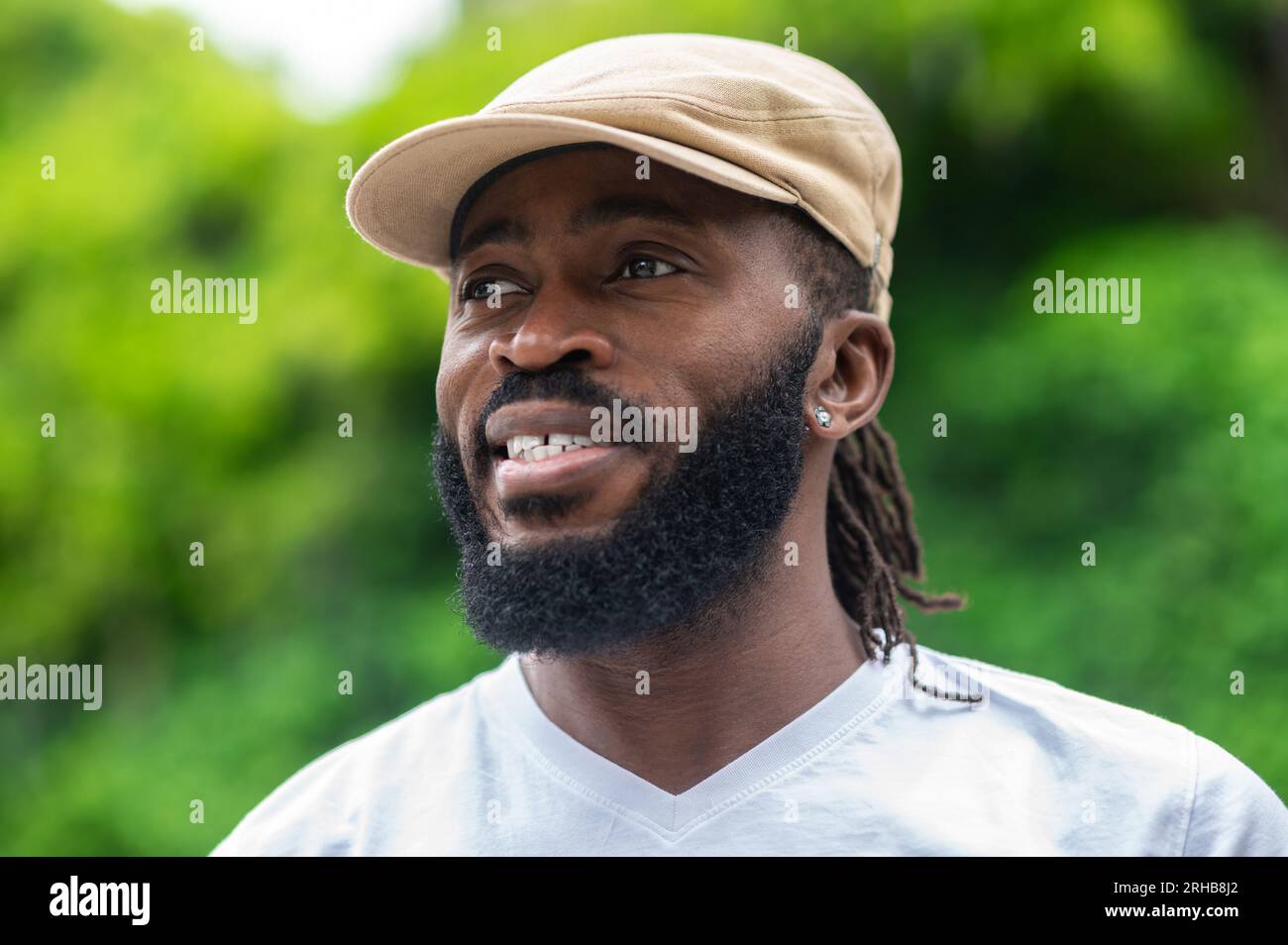 Portrait picture of a smiling dark-skinned handsome man Stock Photo - Alamy Portrait picture of a smiling dark-skinned handsome man Stock Photo - Alamy