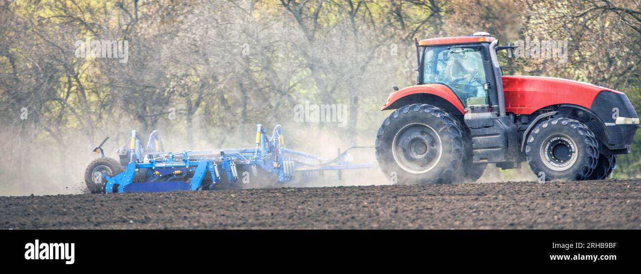 Agricultural Prep: Tractor Cultivating Soil for Crop Planting Stock ...