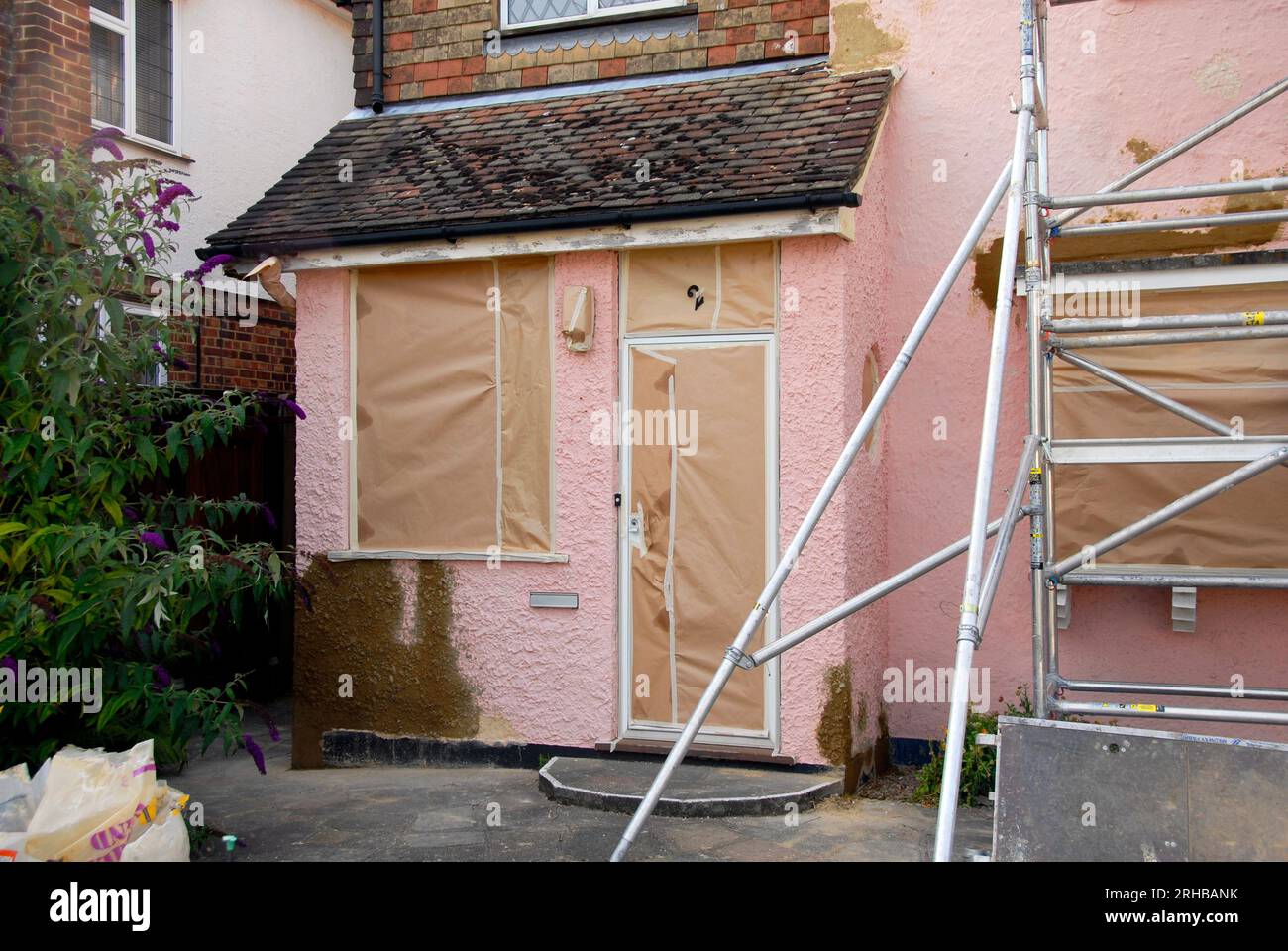 Household maintenance: a movable work platform in use to spray paint ...