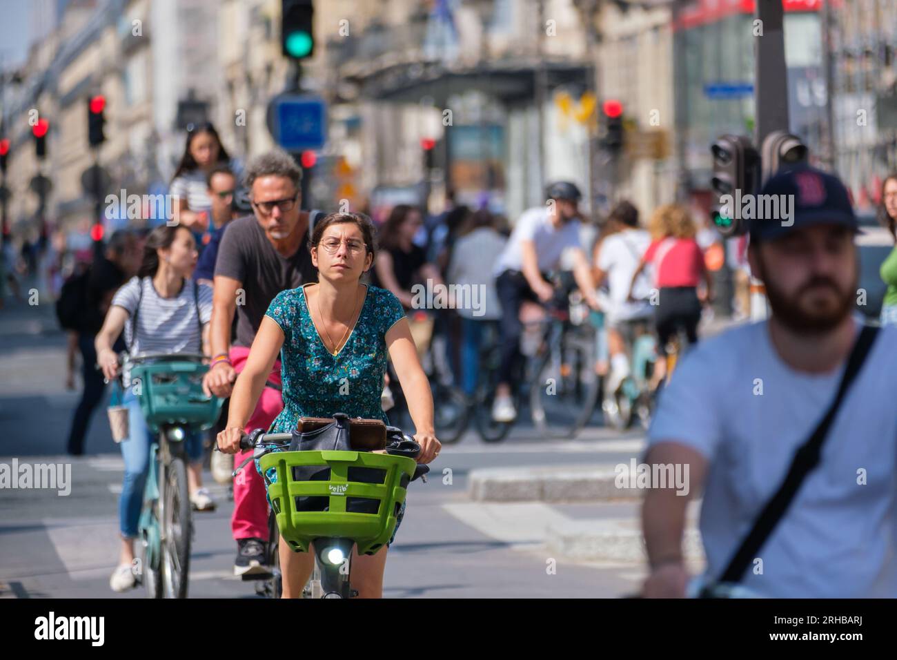 Paris, FR - 31 August 2022: People riding bikes in Paris Stock Photo ...
