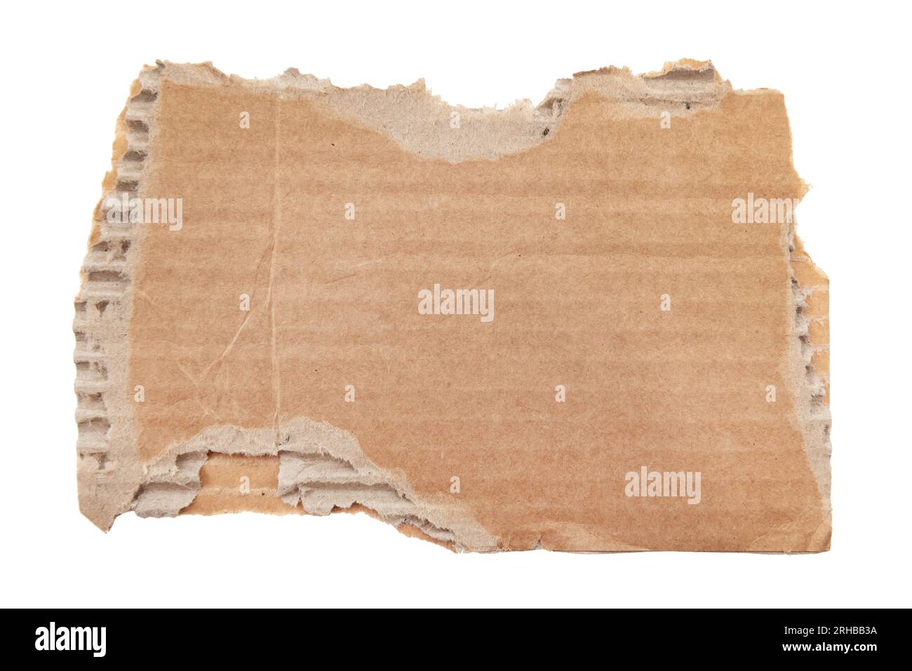 A piece of textured packaging cardboard. Piece of torn cardboard with ...