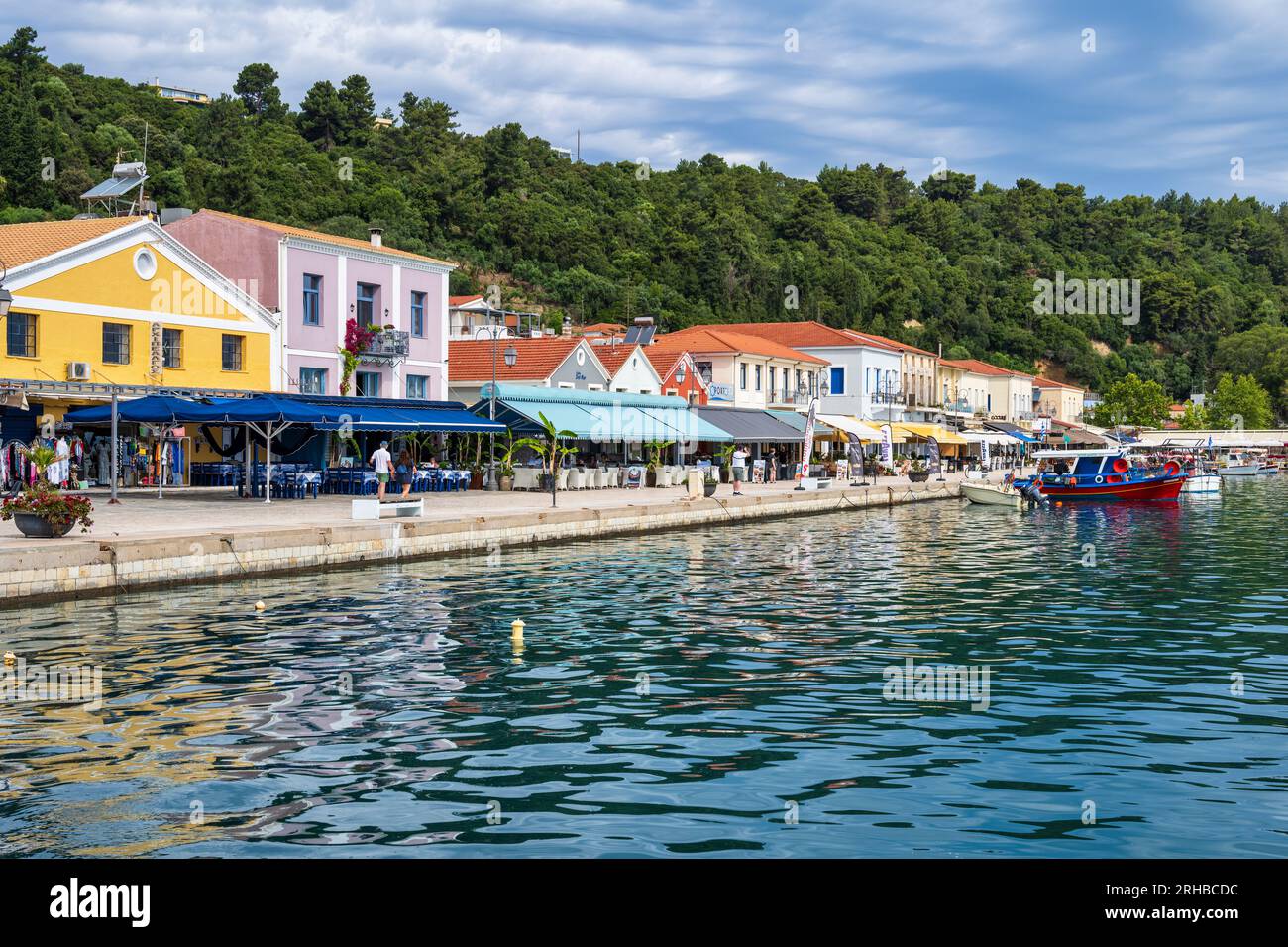 Colourful restaurant, bars and cafes on waterfront of picturesque port ...