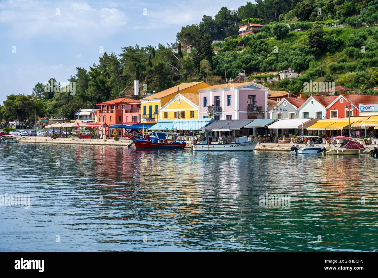 Colourful restaurant, bars and cafes on waterfront of picturesque port ...