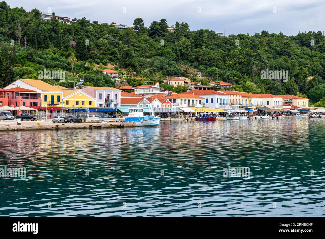 Colourful restaurant, bars and cafes on waterfront of picturesque port ...