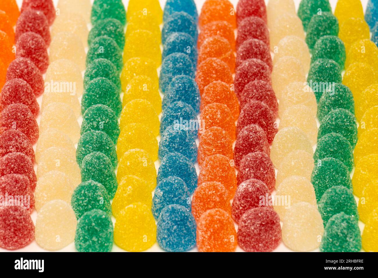 Assorted colorful gummy candies isolated on a white background. Top ...