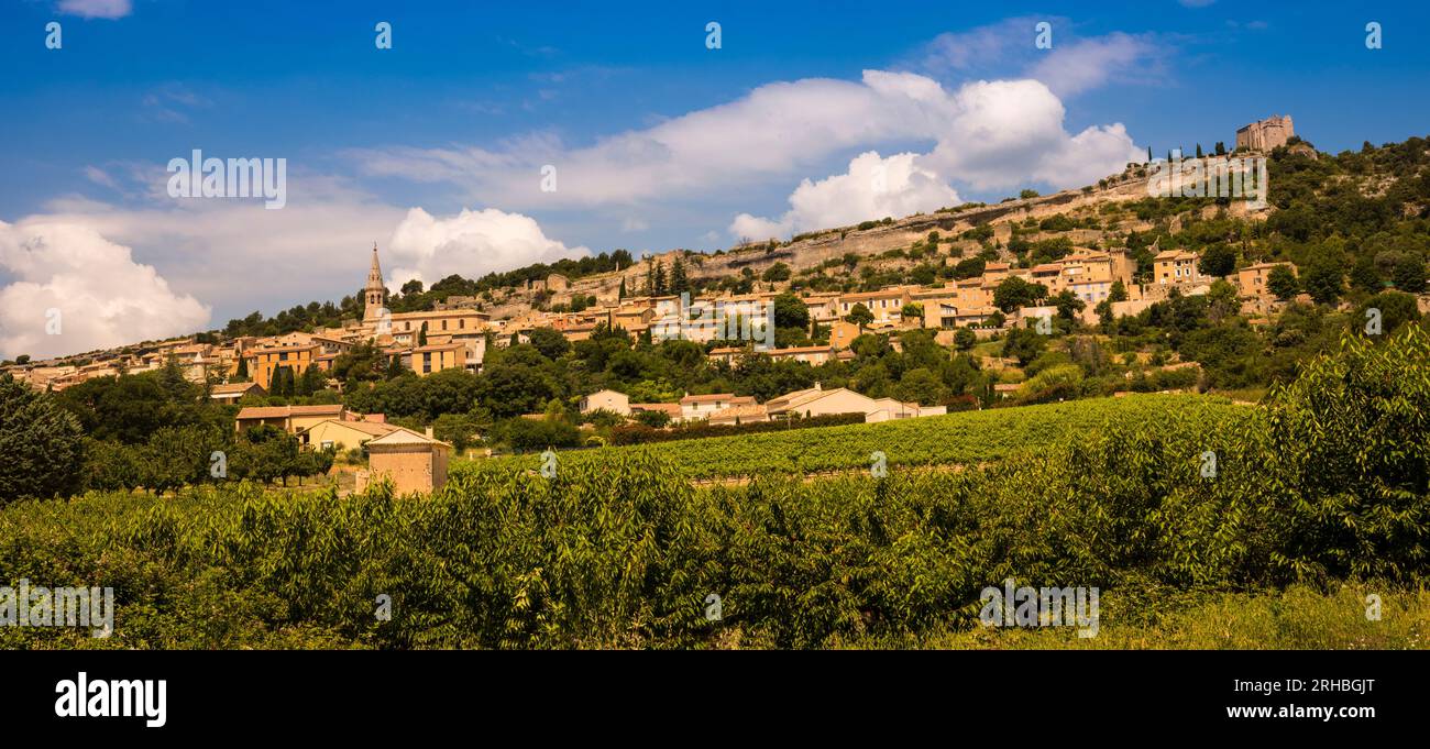 View of Saint-Saturnin-lès-Apt with castle chapel and church. Vaucluse ...