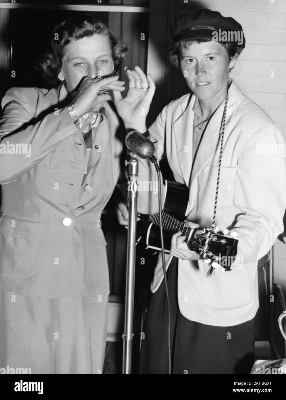 Fresno, California: c, 1948 Babe Didrikson plays harmonica accompanying ...