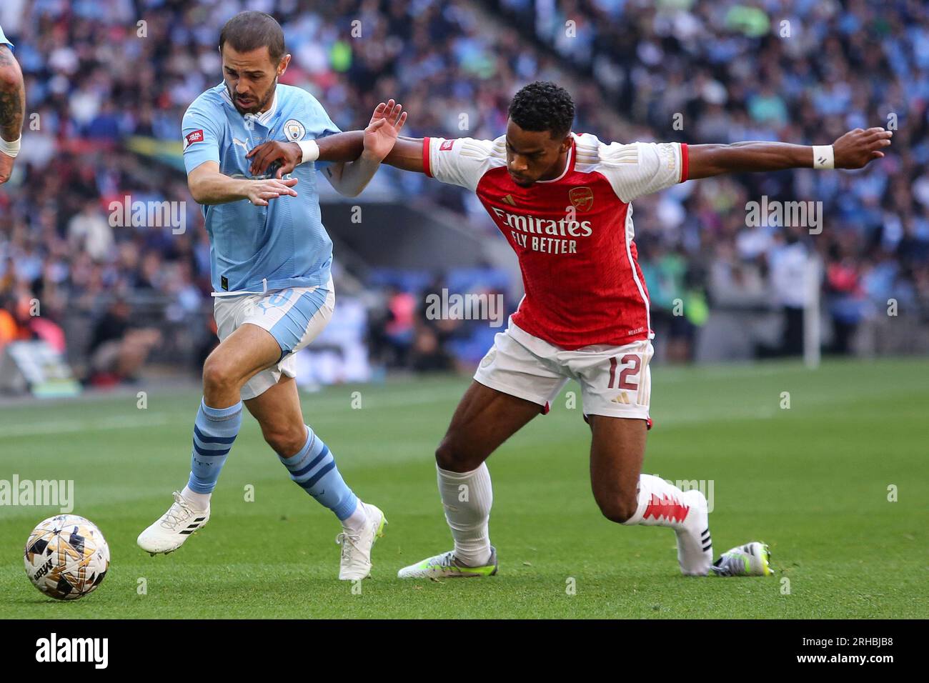 Bernardo Silva of Manchester City and Jurrien Timber of Arsenal - Arsenal v Manchester City, FA ...