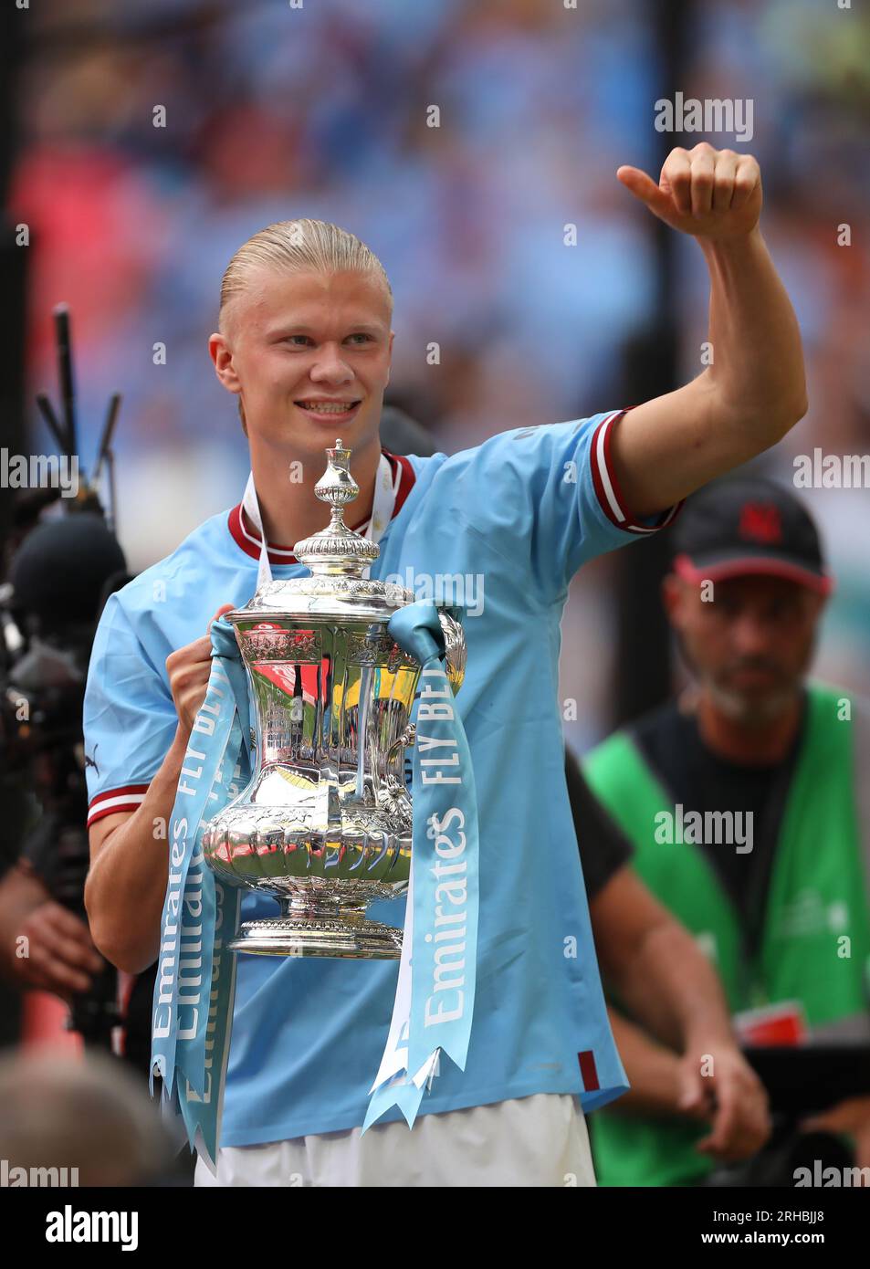 Erling Haaland of Manchester City celebrates with the trophy ...