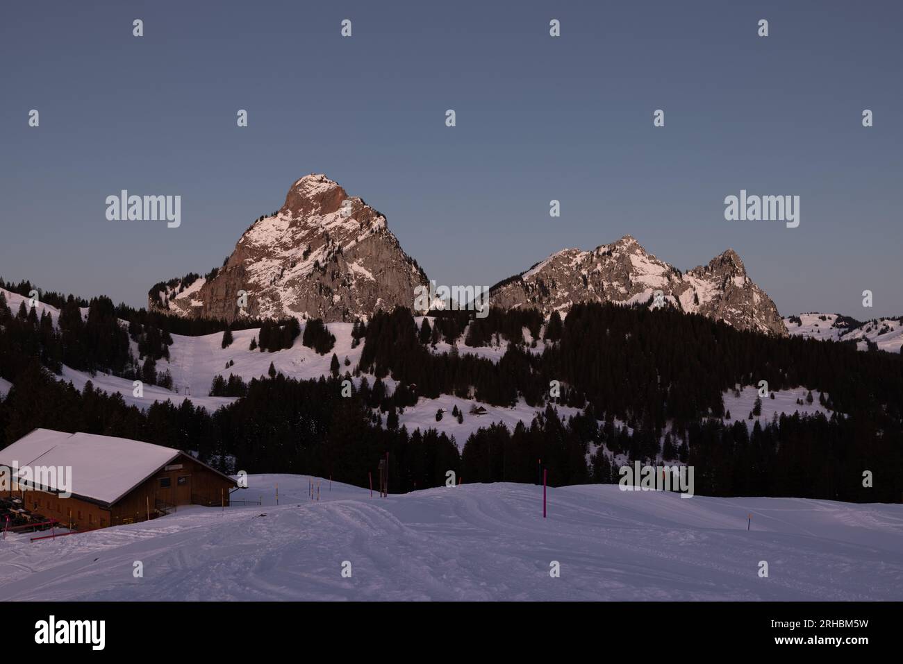 Amazing sunrise with a big mountain in front called Grosser Mythen with ...
