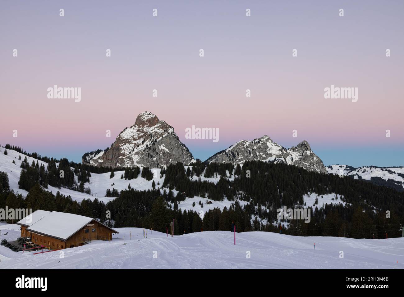 Amazing sunrise with a big mountain in front called Grosser Mythen with ...