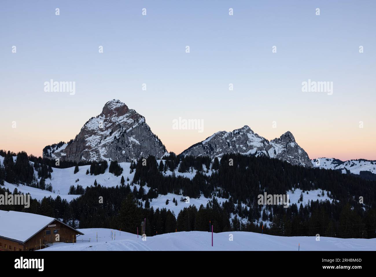 Amazing sunrise with a big mountain in front called Grosser Mythen with ...