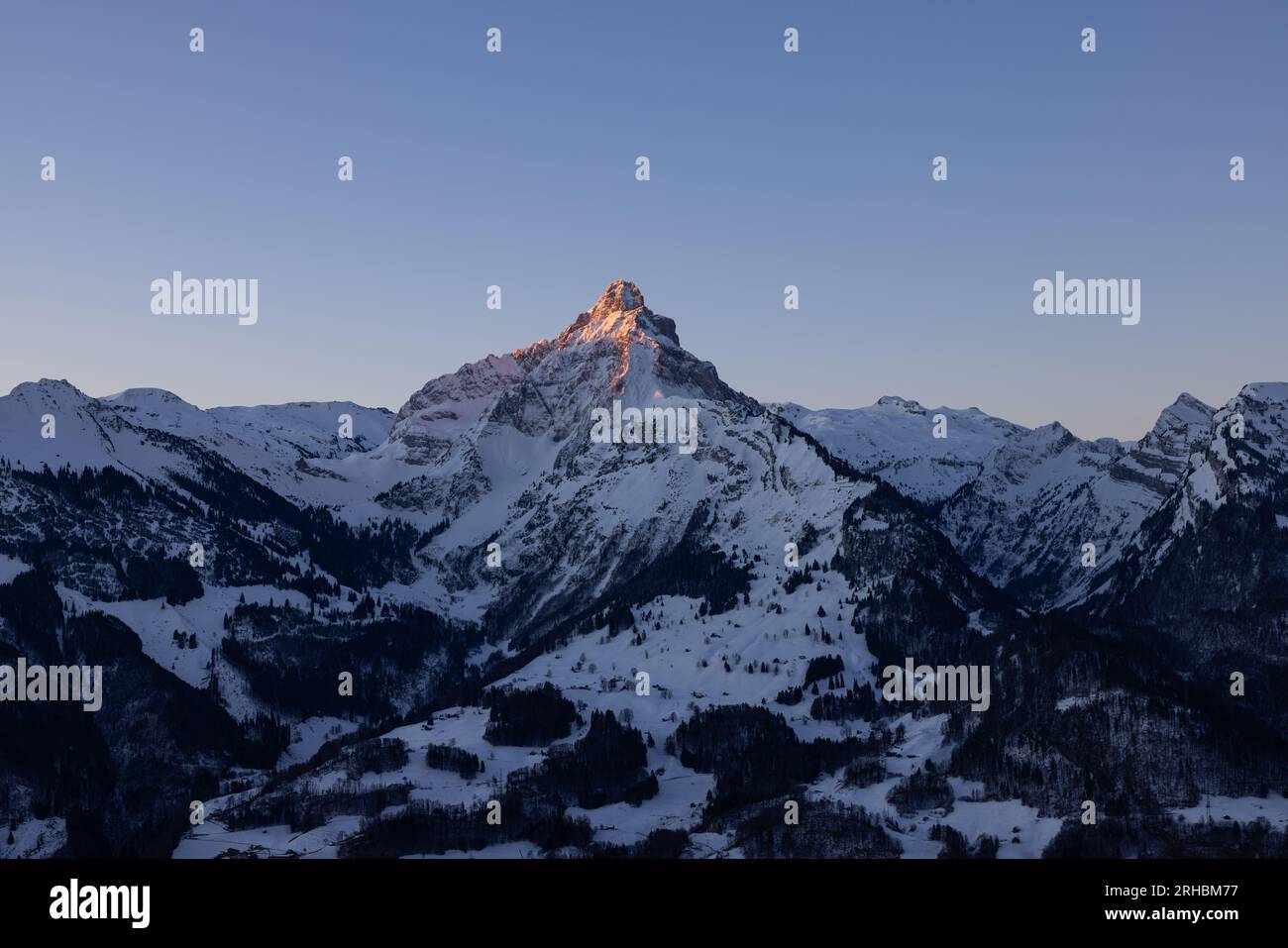 A mountain in the Swiss Alps beautifully set in scene by the morning ...