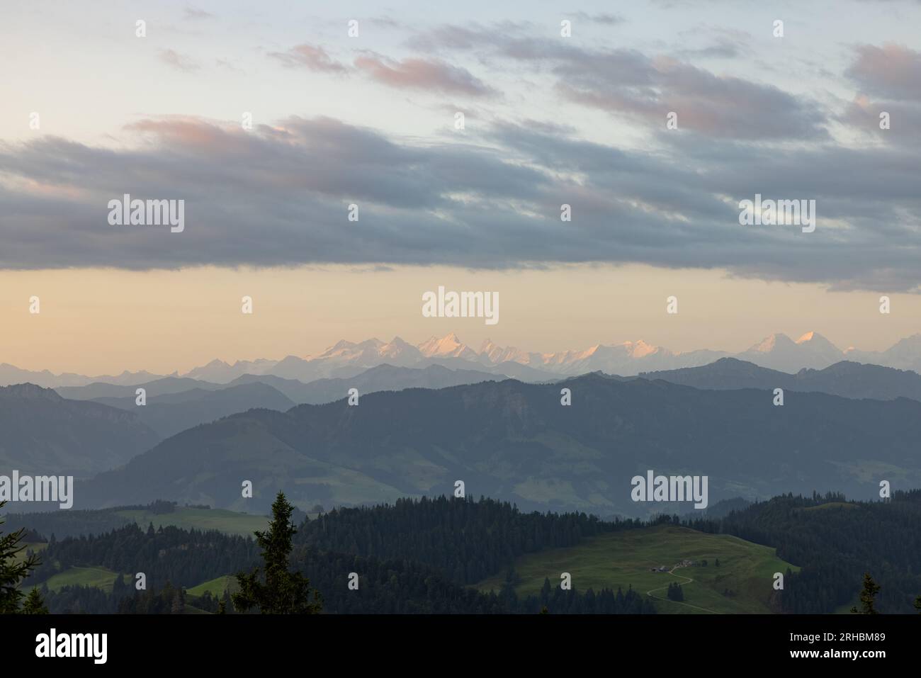 Amazing sunset at a wonderful landscape in Switzerland on a hill called ...