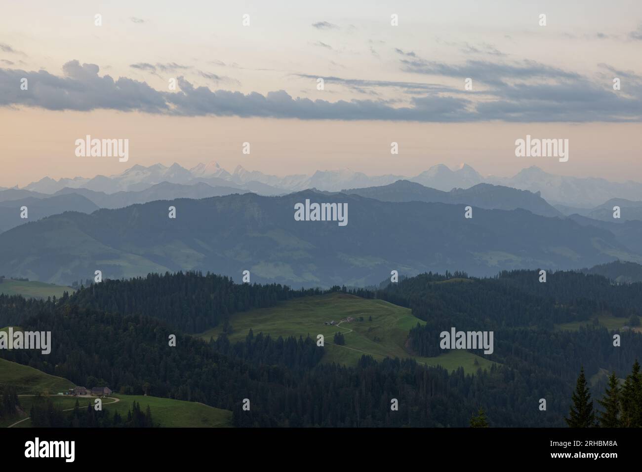 Amazing sunset at a wonderful landscape in Switzerland on a hill called ...