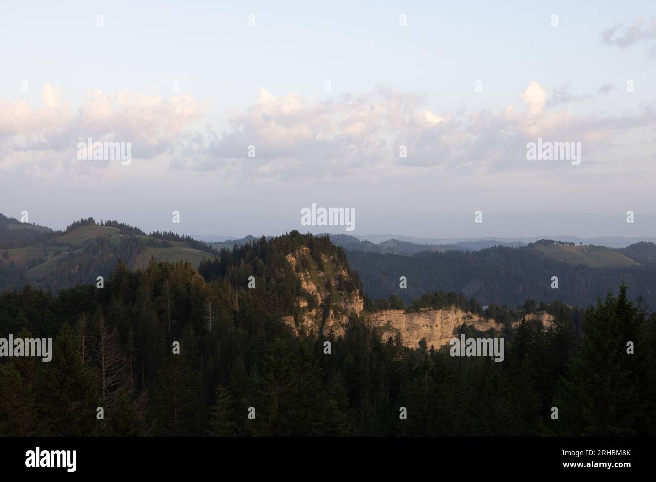 Amazing sunset at a wonderful landscape in Switzerland on a hill called ...