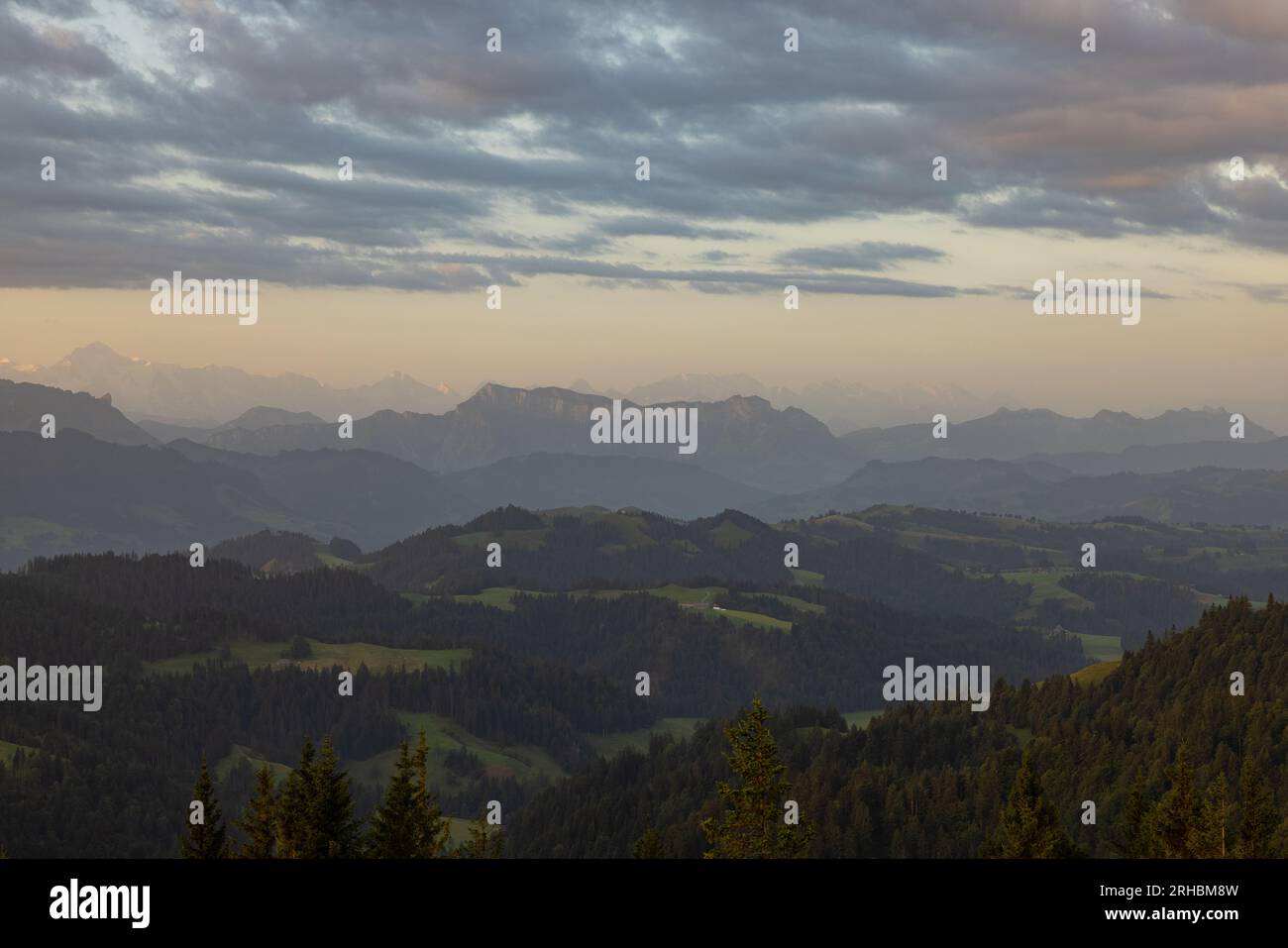 Amazing sunset at a wonderful landscape in Switzerland on a hill called ...