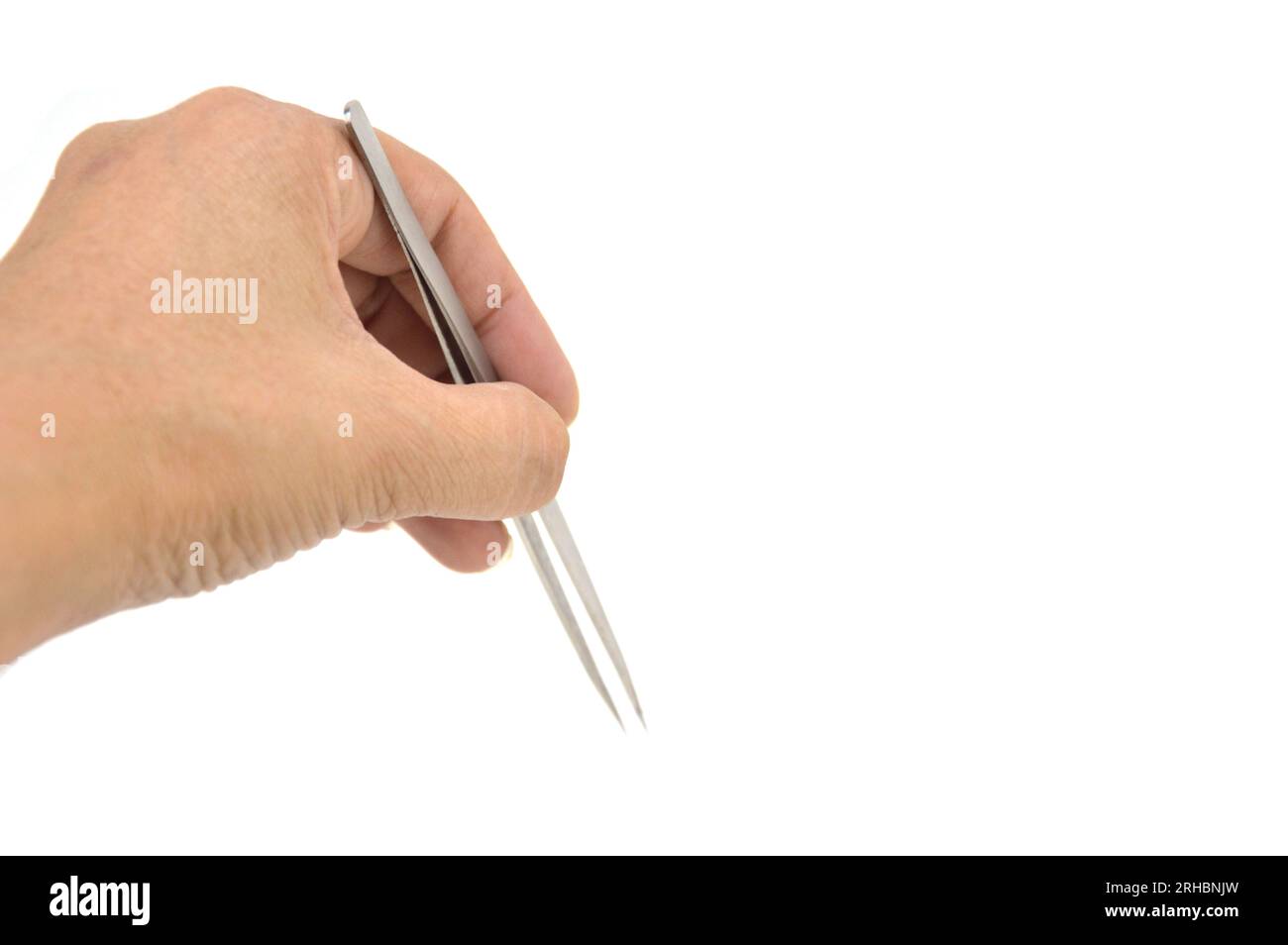 hands using tweezers on a white background Stock Photo - Alamy