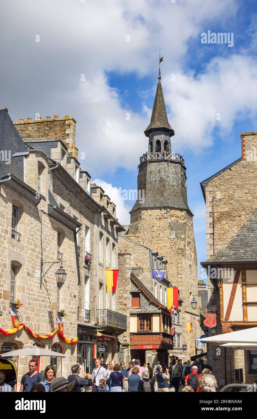 narrow cobbled streets flags and the ancient clock tower in dinan town ...