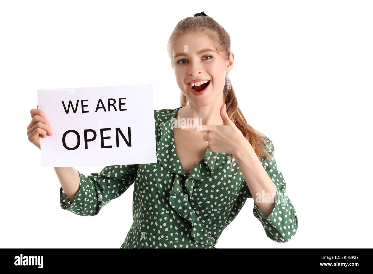 Female seller with opening sign on white background Stock Photo - Alamy