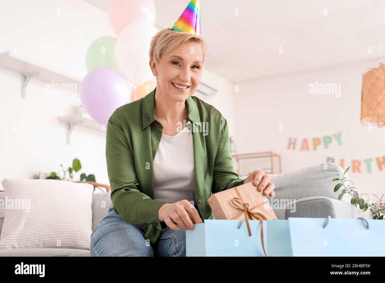 Mature woman taking greeting hi-res stock photography and images - Alamy