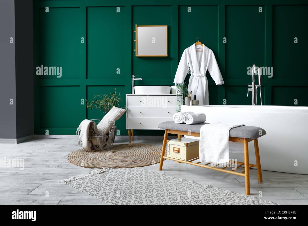 Interior of bathroom with soft bench and bathtub Stock Photo - Alamy