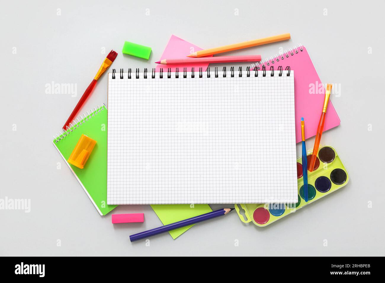 Composition with blank notebook and stationery on light background ...