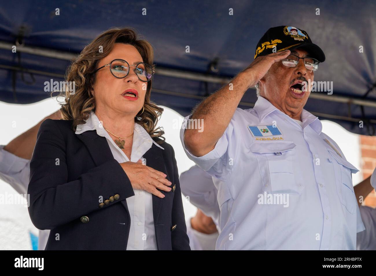 Sandra Torres, presidential candidate of UNE party, left, and retired ...