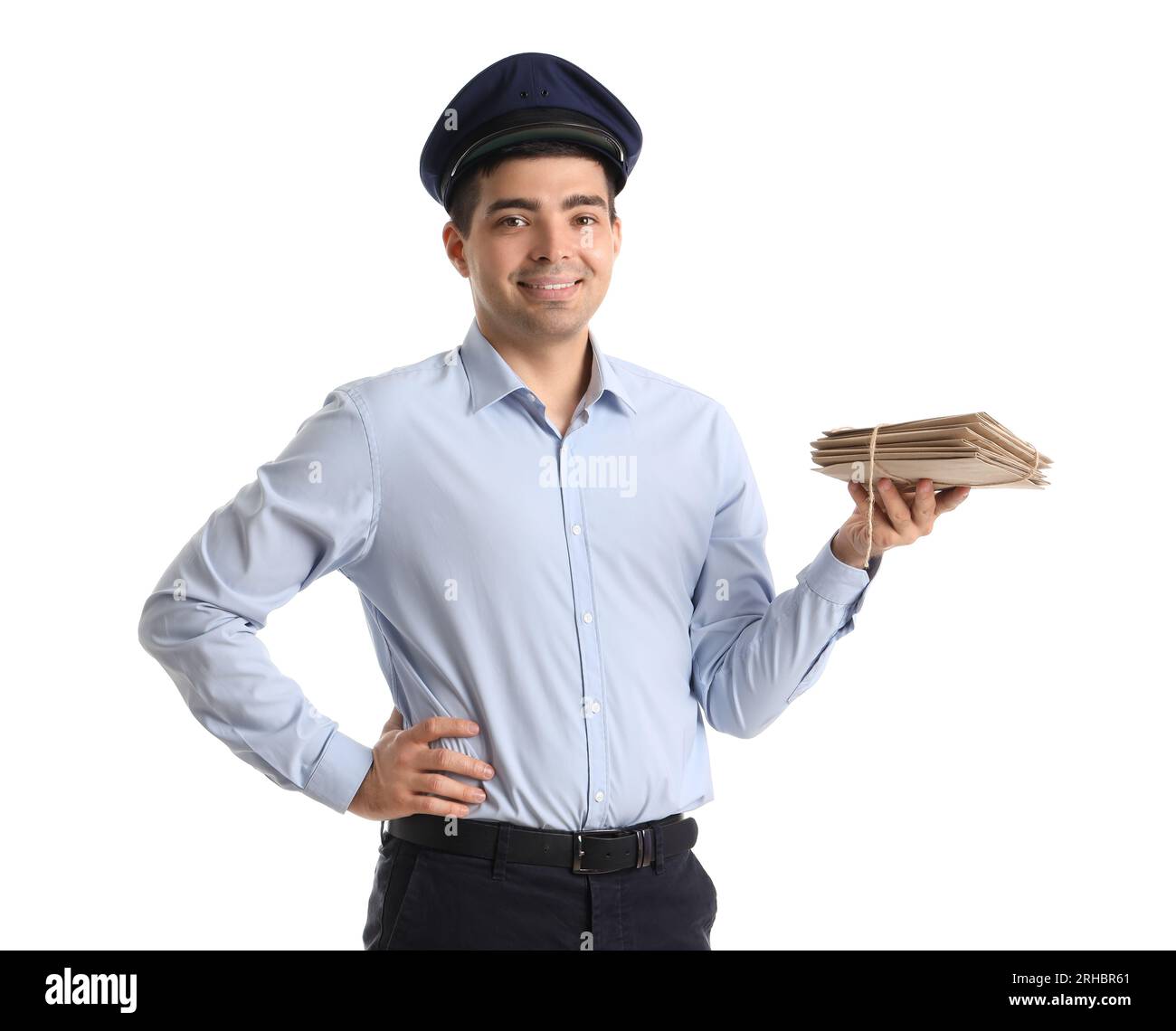Young postman with letters on white background Stock Photo - Alamy