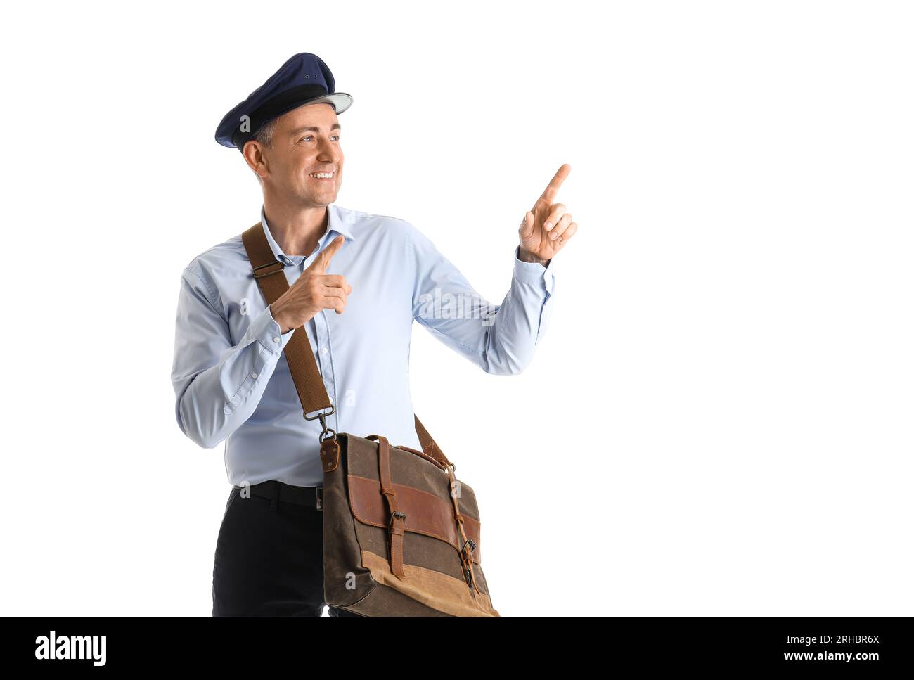 Mature postman pointing at something on white background Stock Photo ...