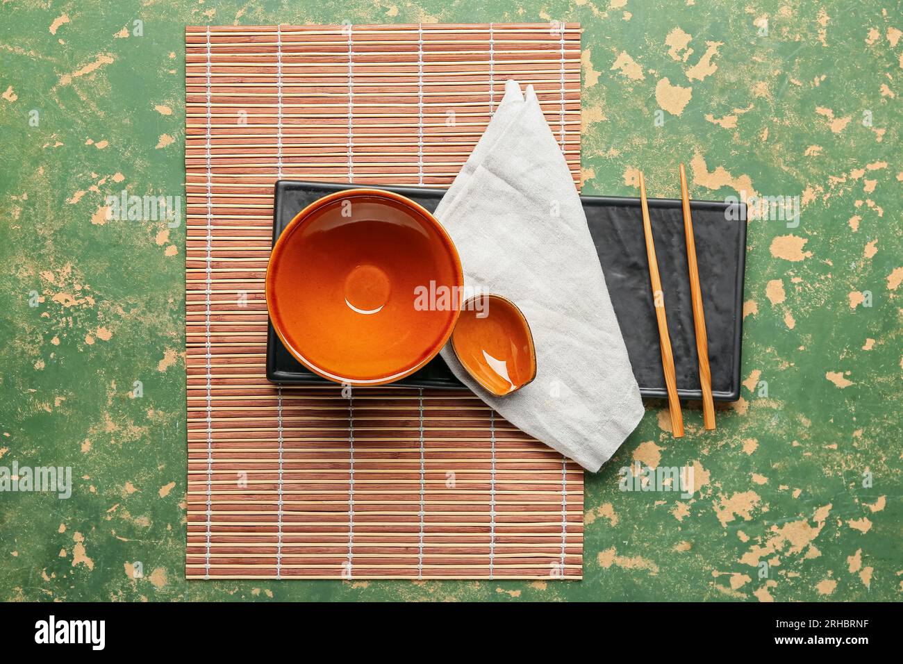Chinese table setting on grunge background Stock Photo - Alamy