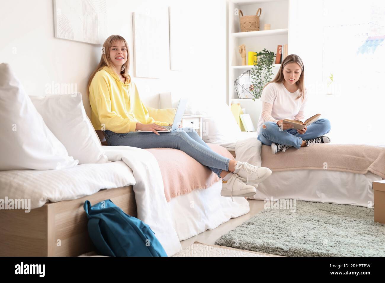 Female students studying in dorm room Stock Photo - Alamy