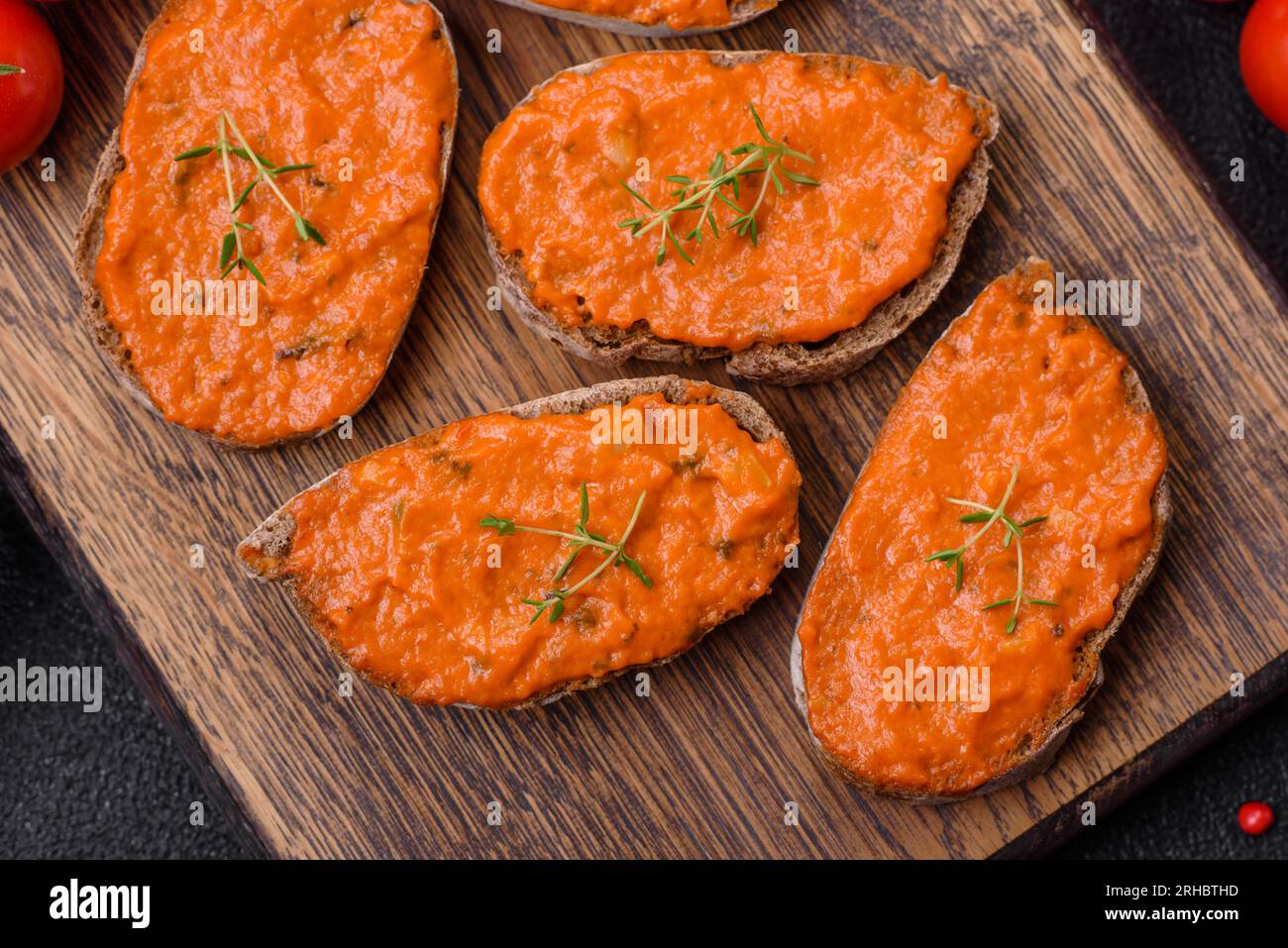 Delicious sandwich consisting of toast, red sauce with salt, spices and ...