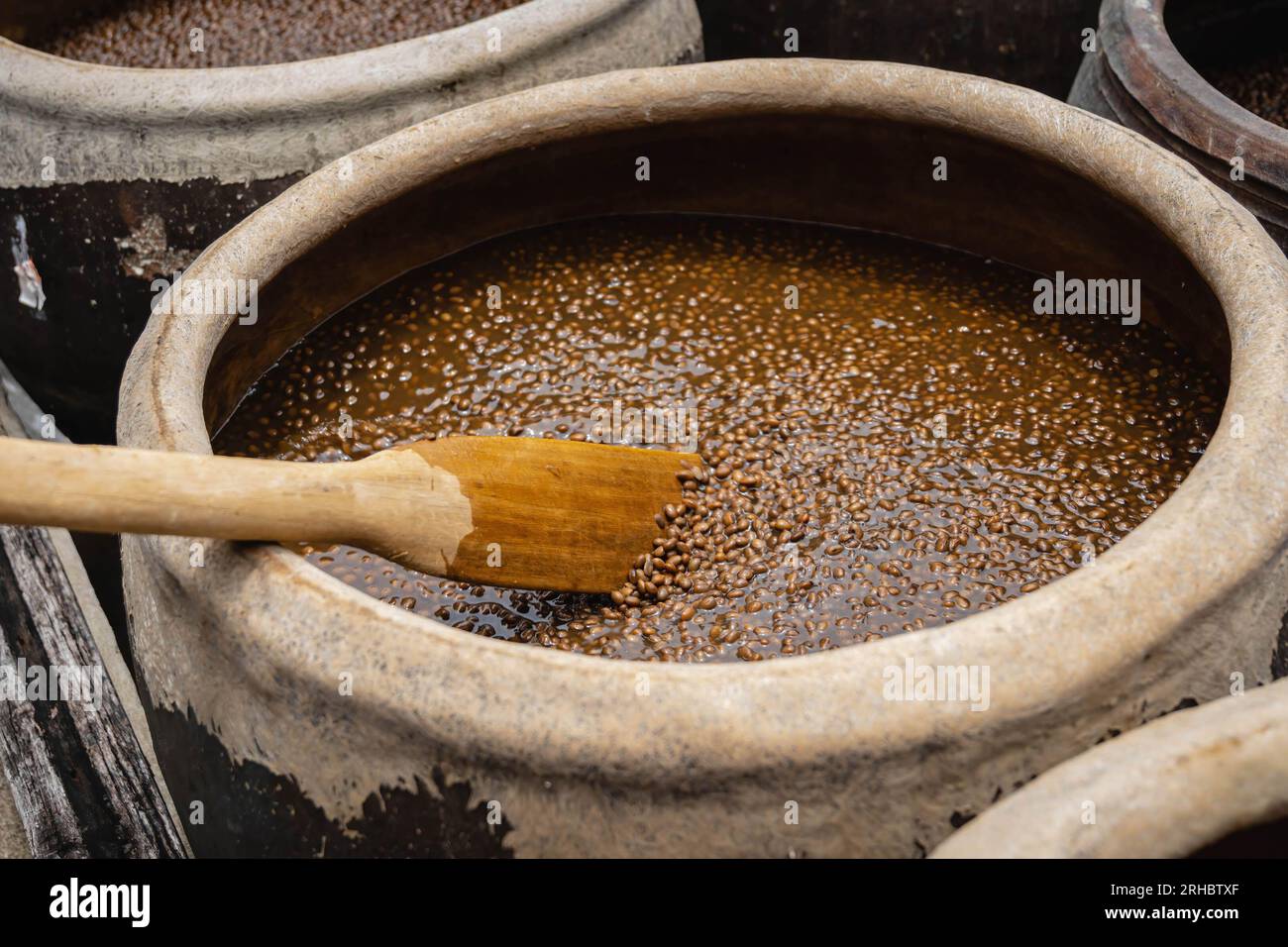 Soybeans, in large containers, are fermenting for another four to five ...