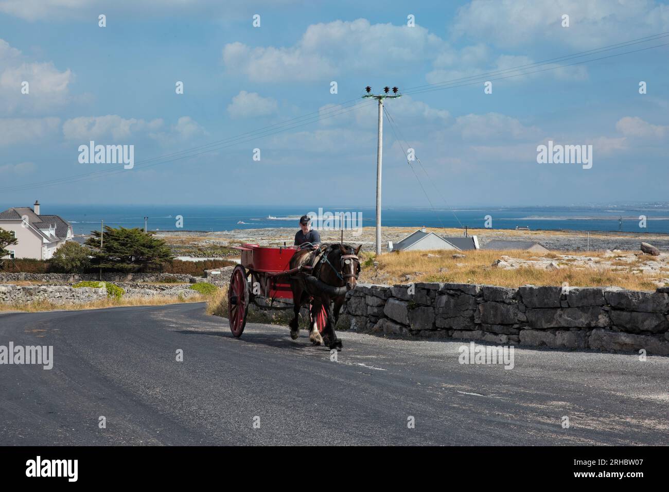 An Irish Local out driving his draft Horse and Cart on Inishmore Island ...