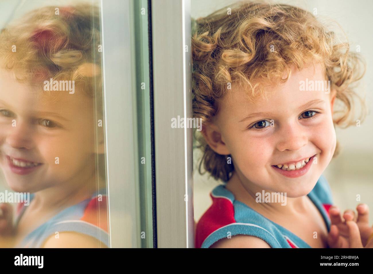 Excited boy sitting near hi-res stock photography and images - Alamy